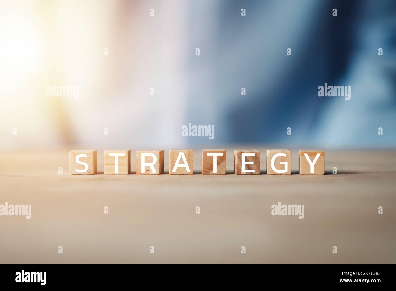 Strategy text on the woods block square. Business strategy, Action plan ...