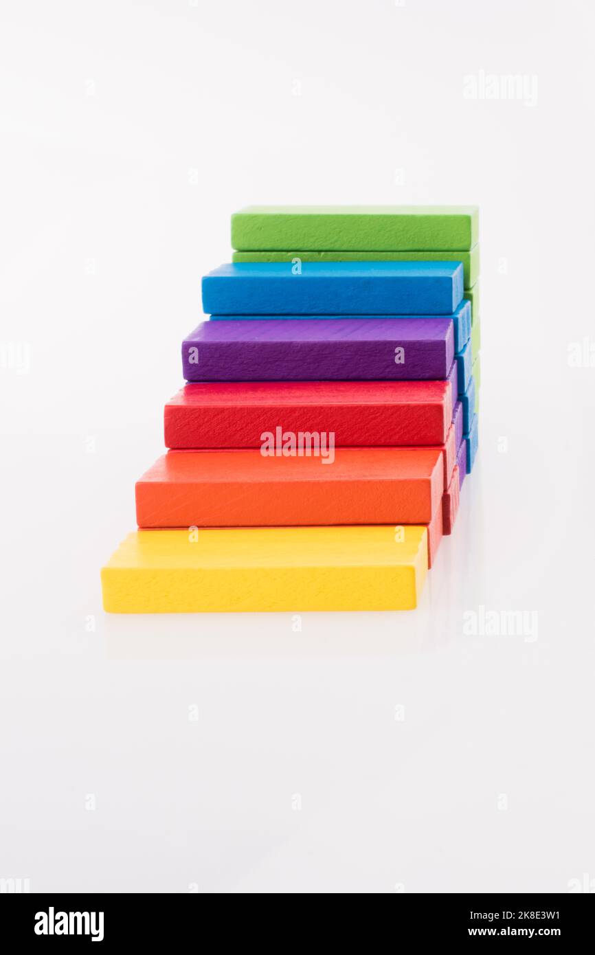 Multi color domino on white background Stock Photo - Alamy