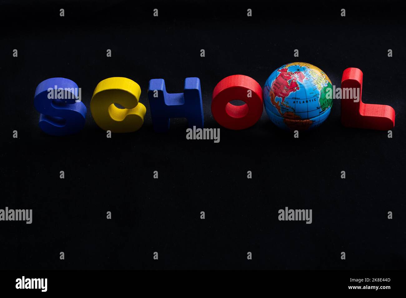 Education concept by School lettering with colorful wooden letters ...