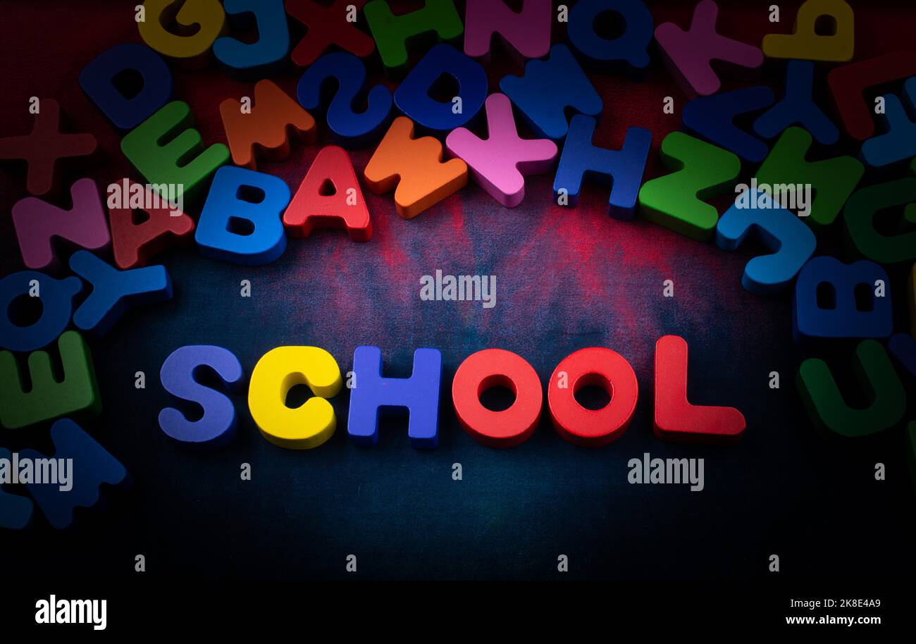 Education concept by School lettering with colorful wooden letters ...