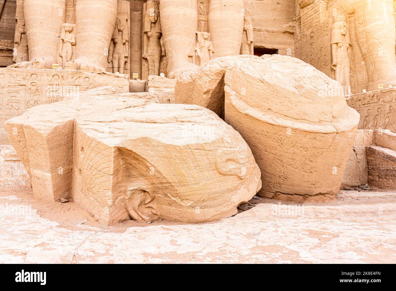 Part of an Egyptian temple ruin on the ground Stock Photo - Alamy