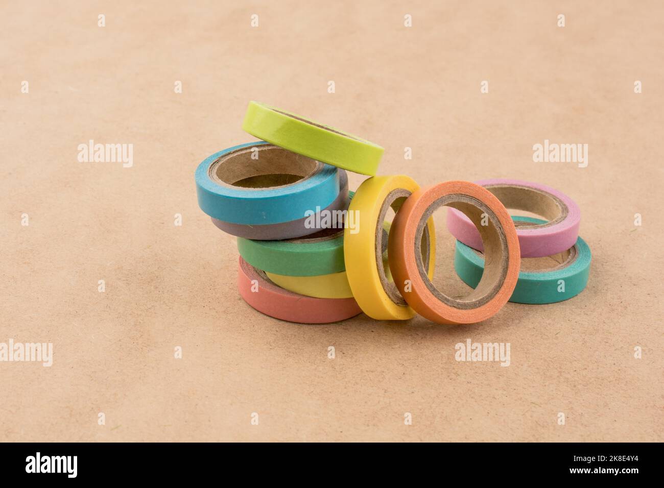 Colorful insulating adhesive tapes on yellow background Stock Photo - Alamy