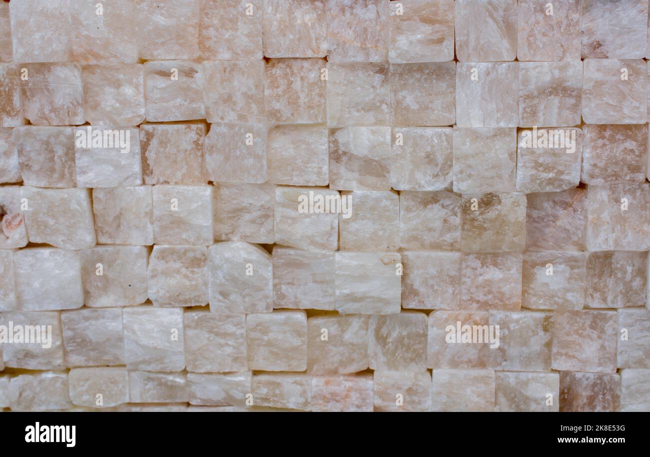 Decorative cubic stone wall as background texture Stock Photo - Alamy