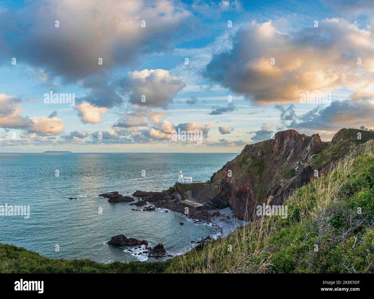 Beautiful sunrise landscape image of Devon coastline in England with ...