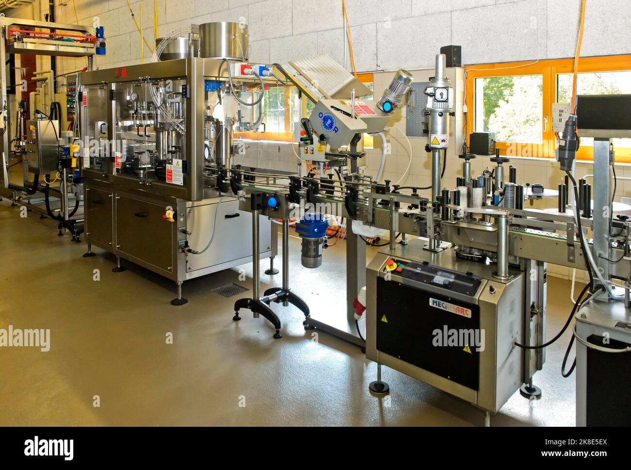 Bottling line and labelling machine in the St Jodern winery for the ...