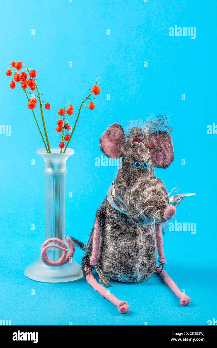 Rat - soft toy made of felted wool on a blue background Stock Photo - Alamy