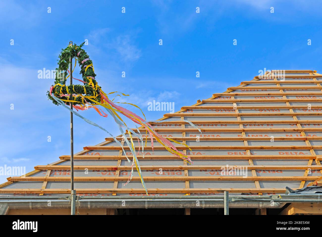 Topping-out wreath at a topping-out ceremony for a single-family house ...