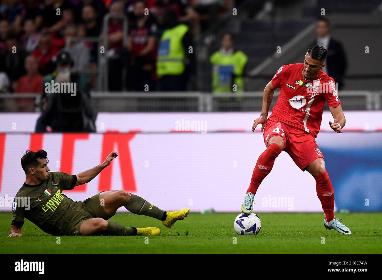 Milan, Italy. 22 October 2022. Dany Mota of AC Monza is tackled by ...