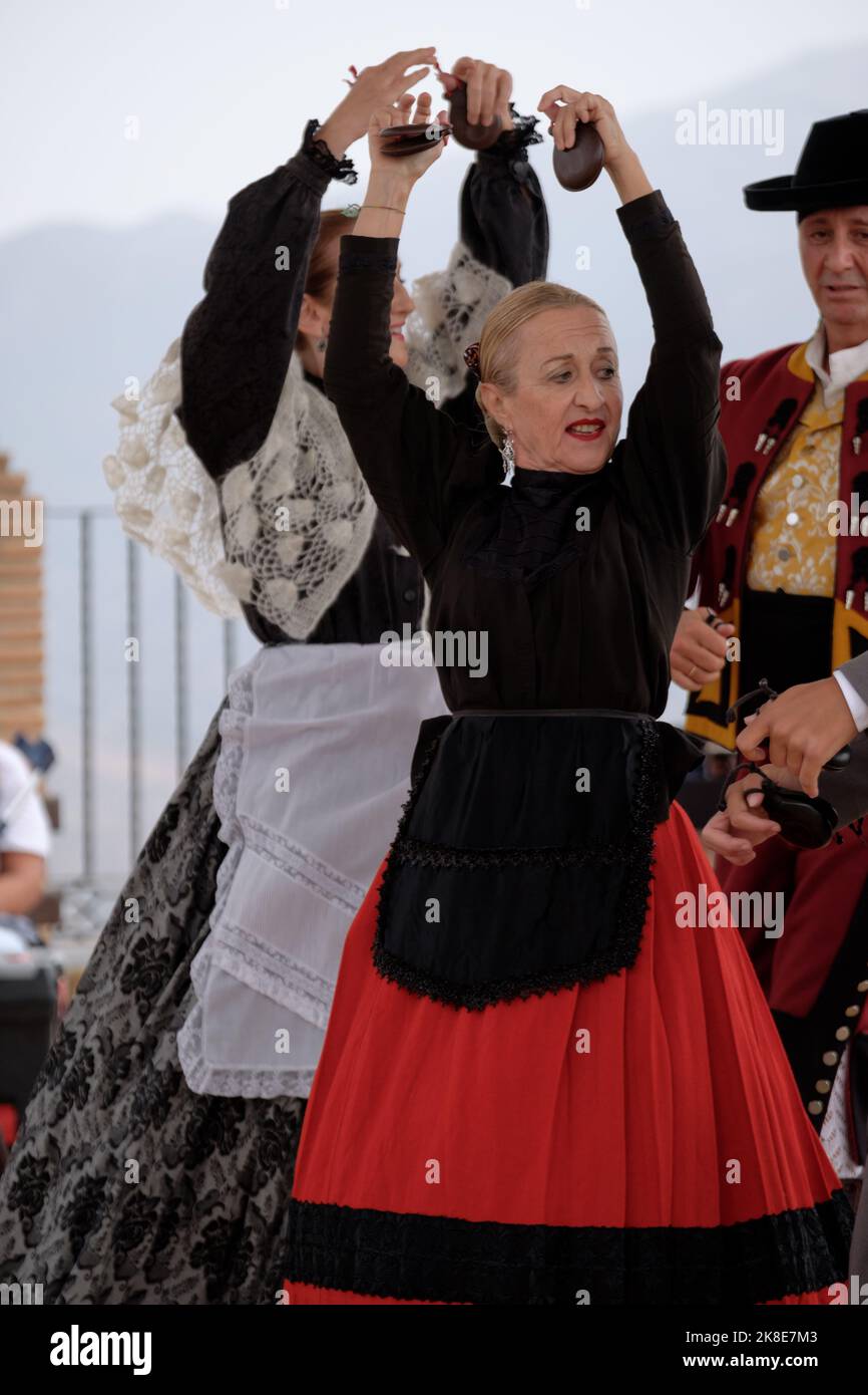 Traditional Malaga dress, dance and folk music in the white village of ...