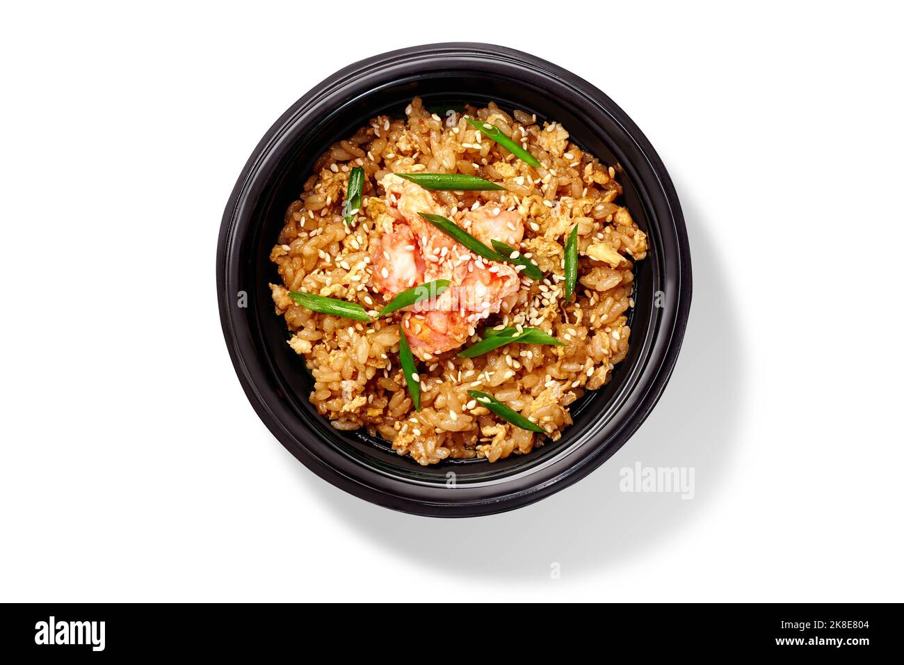 Seafood chahan stir fried rice with shrimps, sesame and greens in black ...