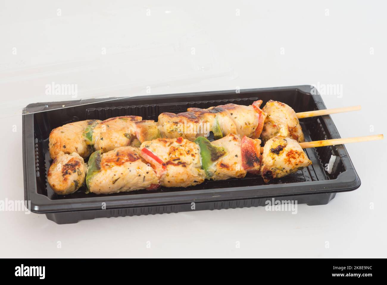 turkey skewer with pepper and condiment Stock Photo - Alamy
