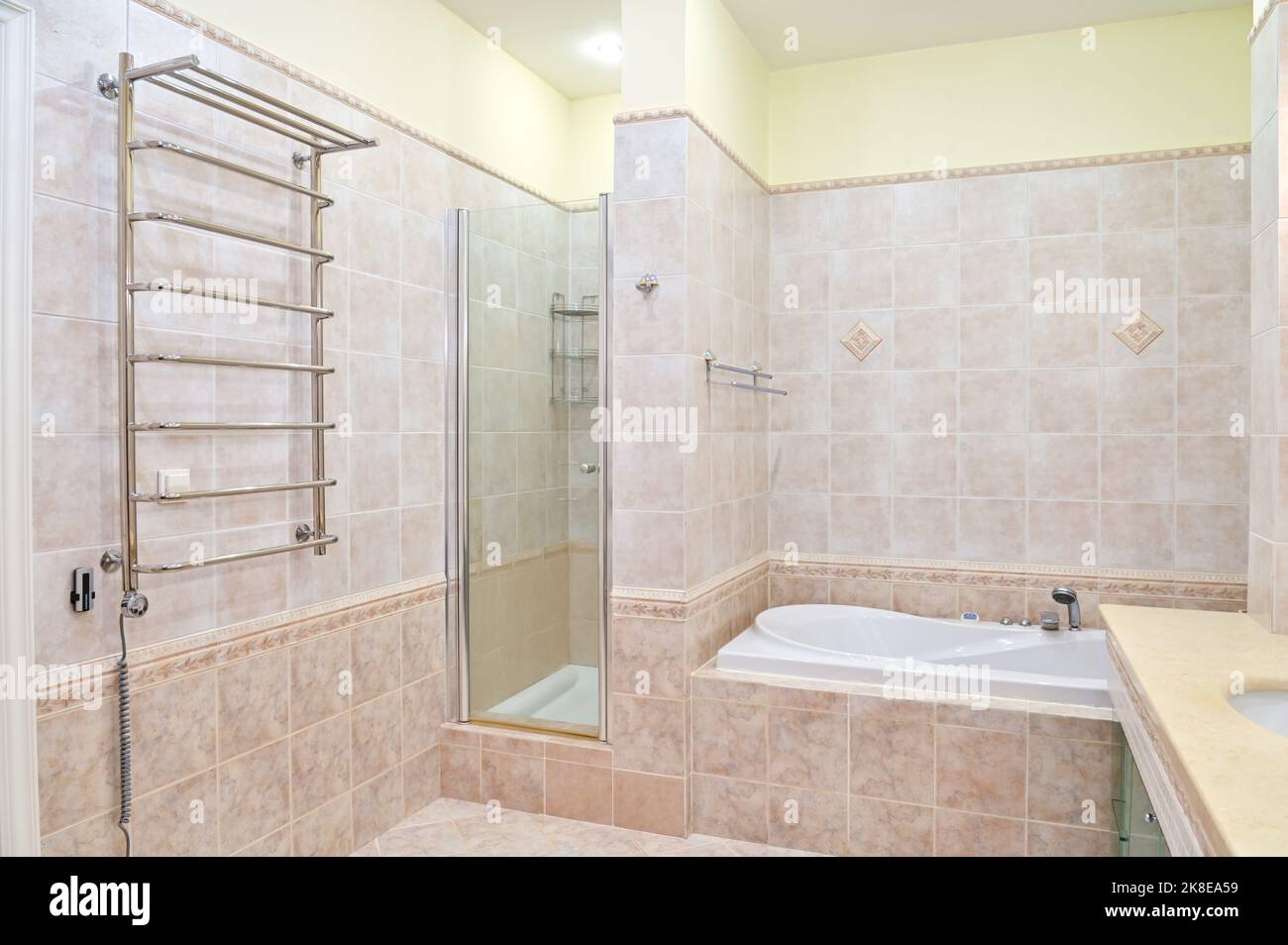 Clean bathroom in hotel room with bath and shower Stock Photo - Alamy