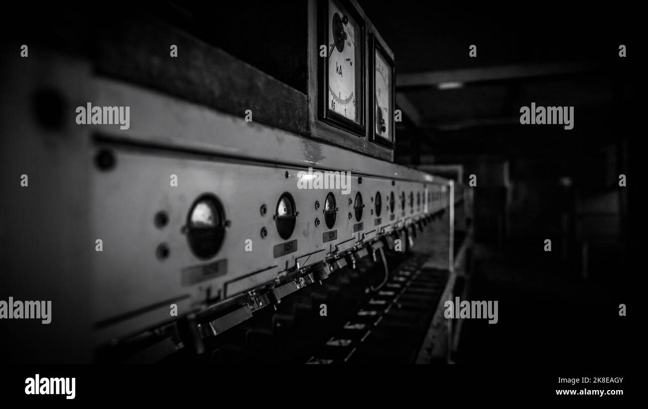 an old switchboard. Analog displays and slots for electrical equipment ...