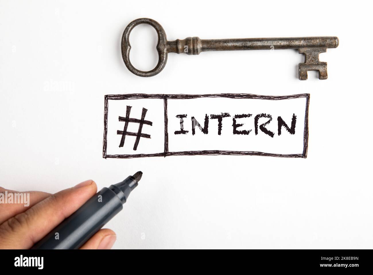 Intern. Text, key and hand with marker on white background Stock Photo ...