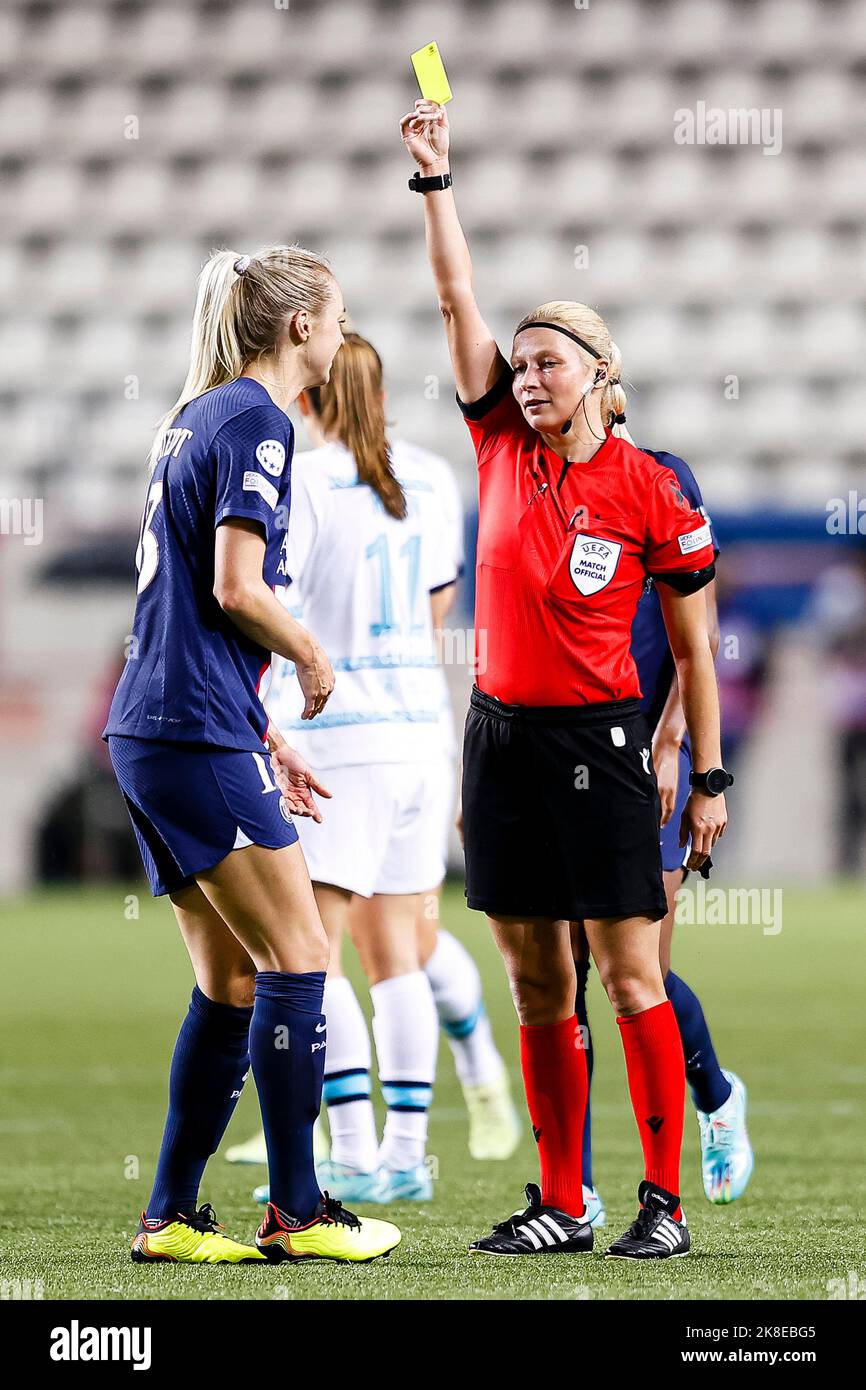PARIS, FRANCE - OCTOBER 20: Referee Ewa Augustyn (R) shows a yellow ...