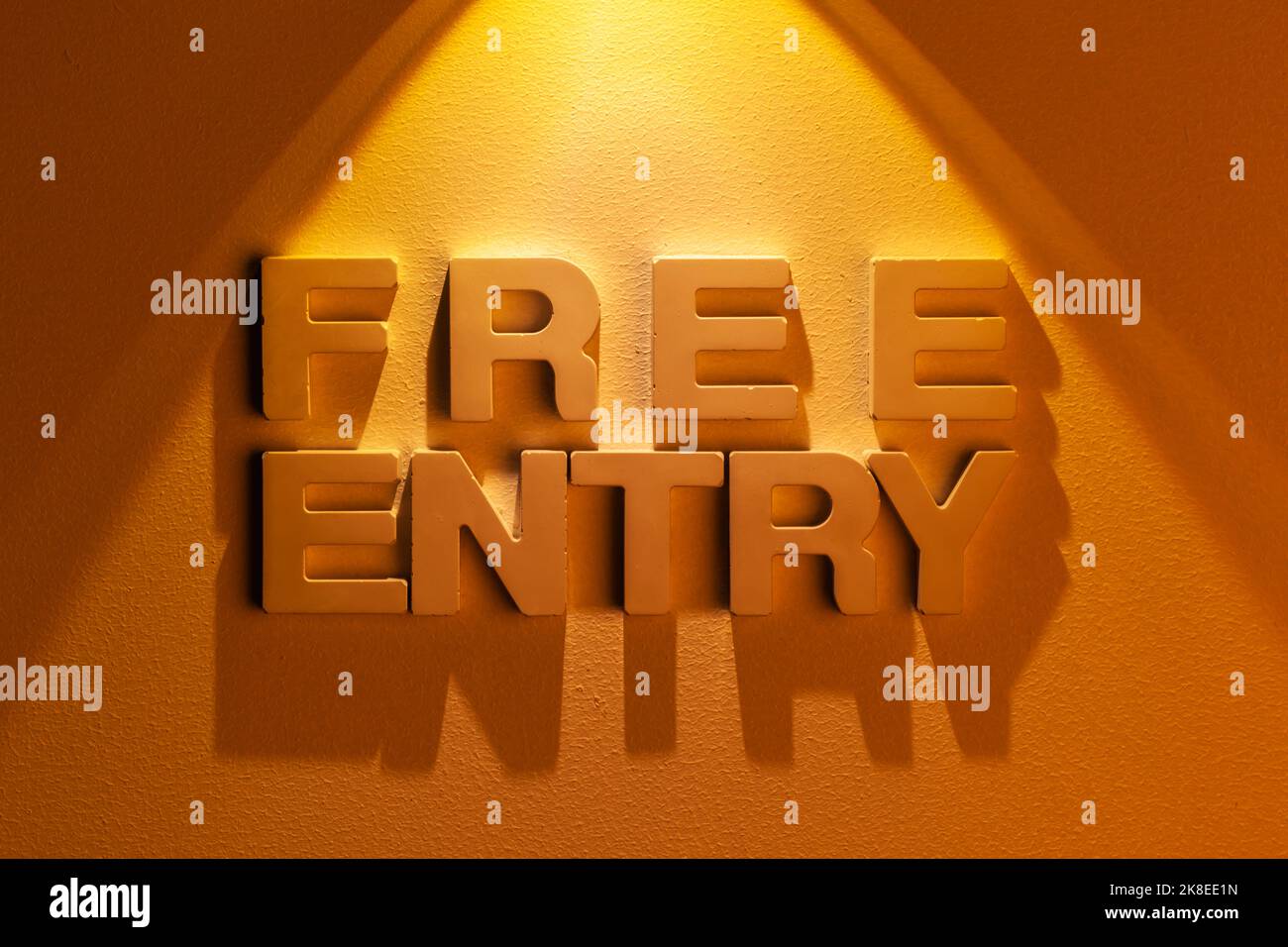 Free Entry sign in the bright light Stock Photo - Alamy