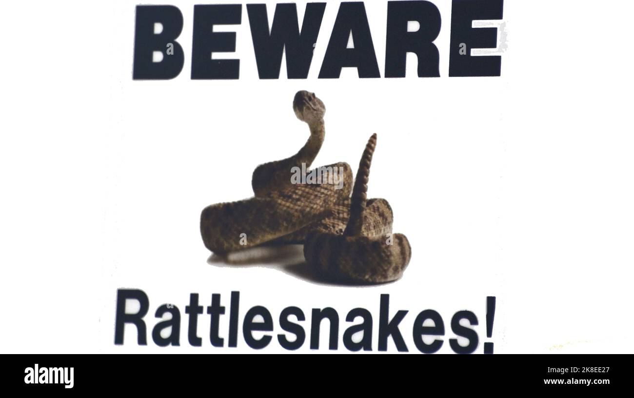 Danger rattlesnakes sign Cut Out Stock Images & Pictures - Alamy