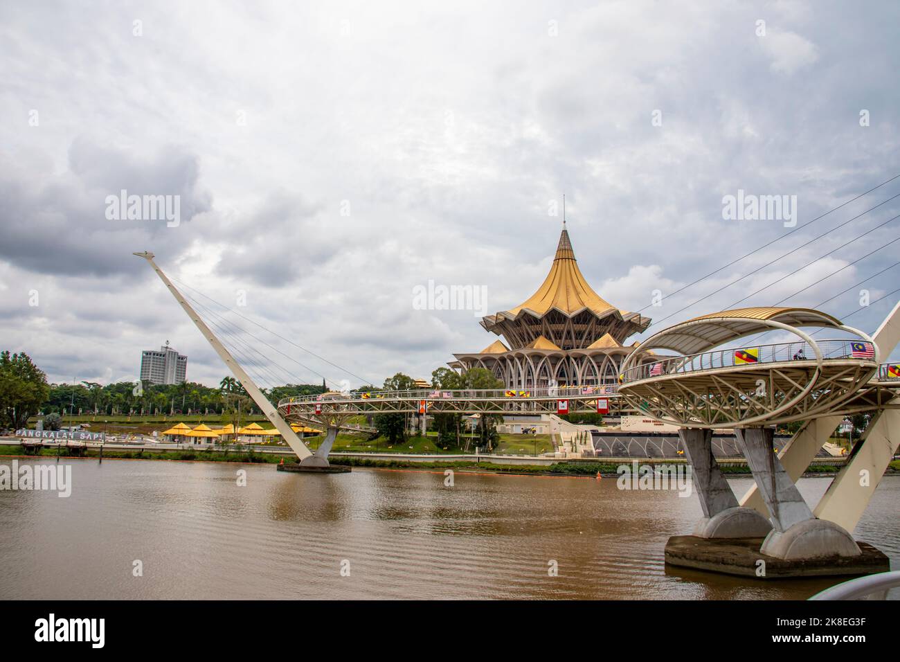 the view of Sarawak river and the view of Darul Hana Bridge in Kuching ...