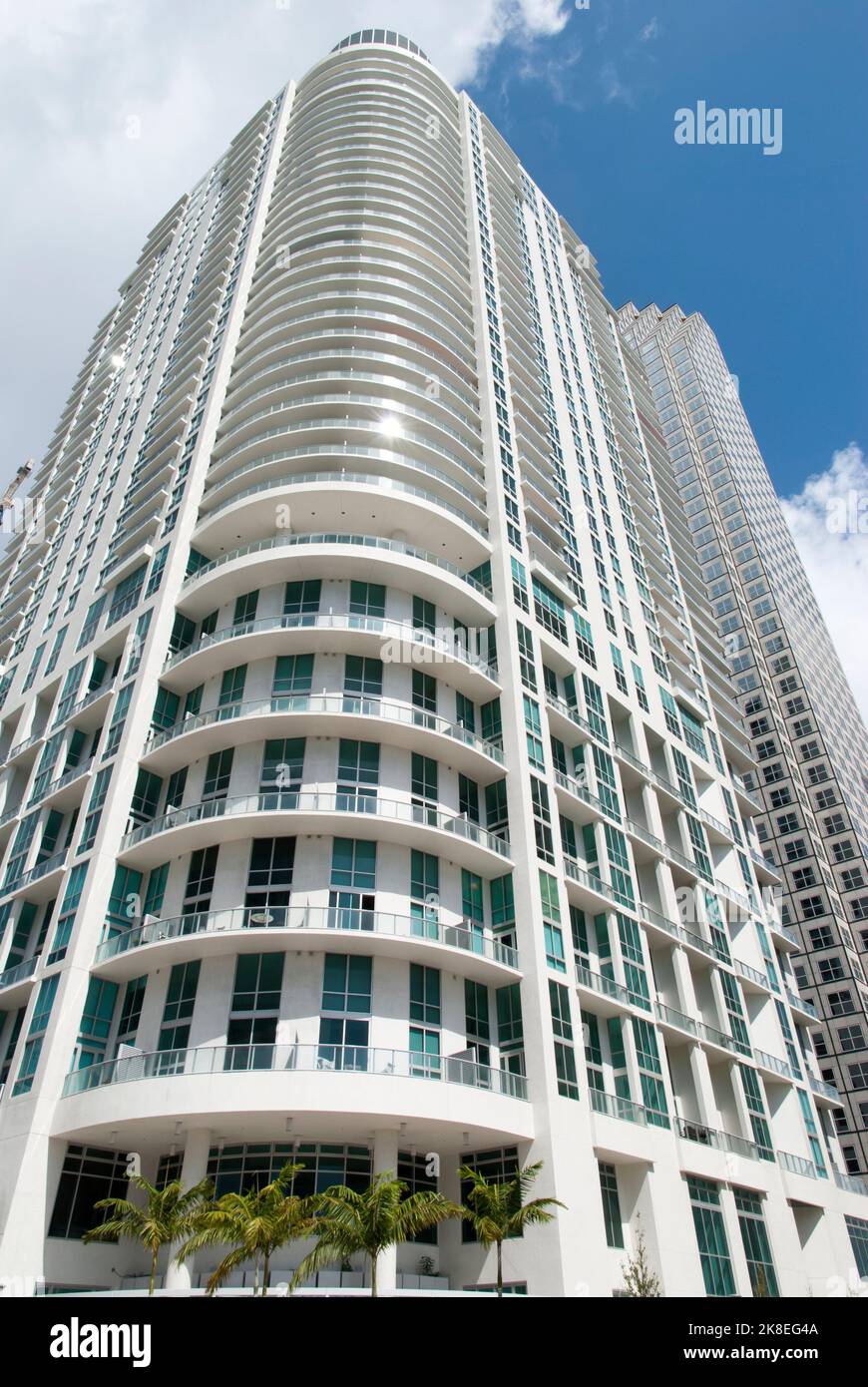 The tall white color residential building in Miami downtown (Florida ...