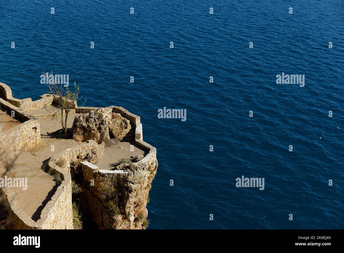 castle on the background of the sea of rich turquoise color Stock Photo ...