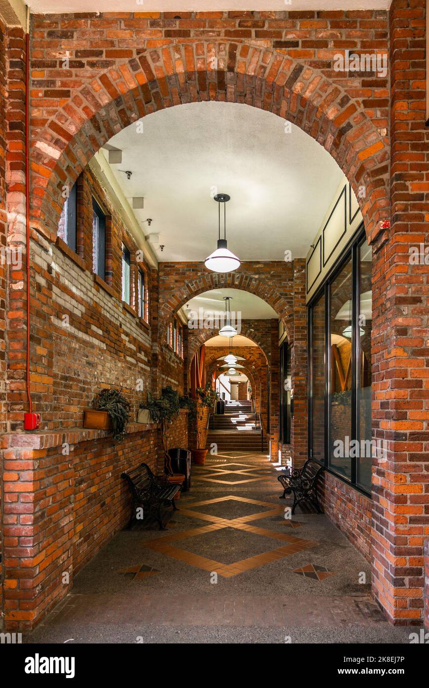 A brick corridor in Victoria on Vancouver island, in the evening Stock ...