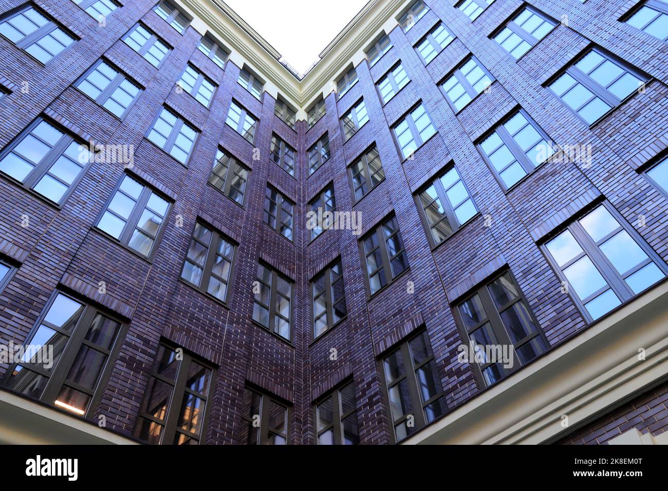Purple inner corner of building. House with large panoramic windows ...