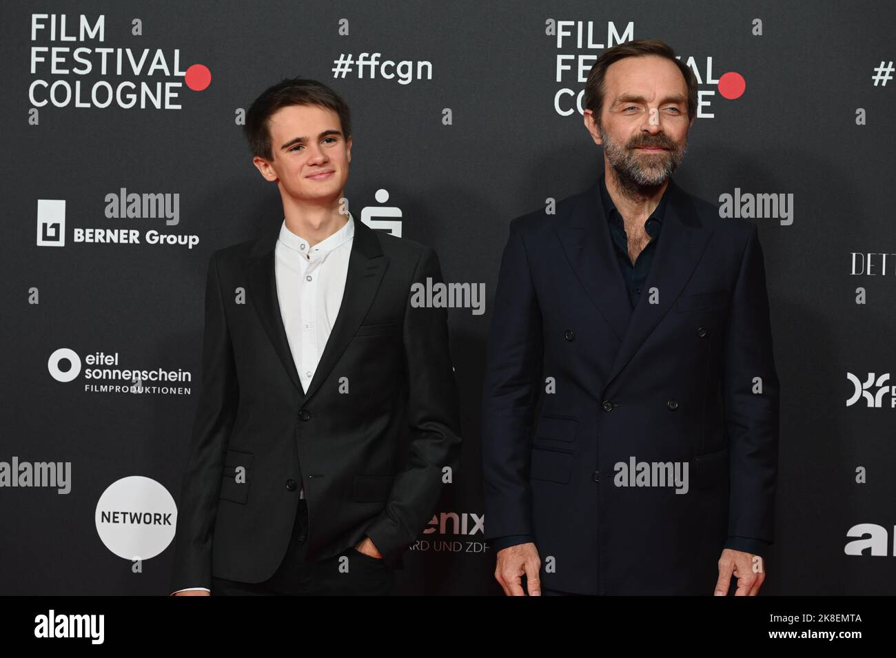 Cologne, Germany. 21st Oct, 2022. Actors Aaron Kissiov (l) and ...