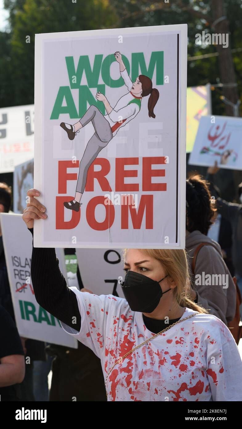 A protester holds a placard during the demonstration. Nationwide ...