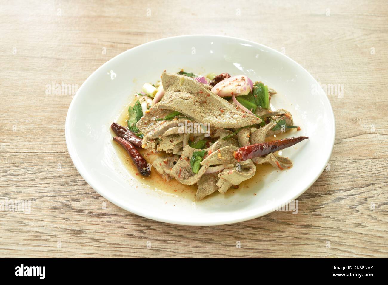 Thai spicy boiled slice pork liver with skin salad on plate Stock Photo ...
