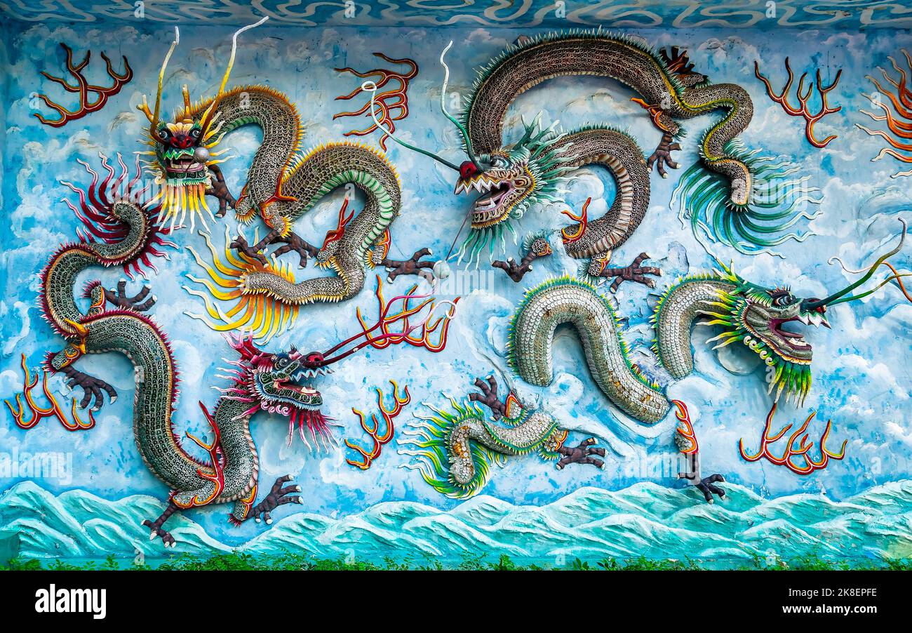Close up of Nine-Dragon Wall at Haw Par Villa Theme Park. This park has ...