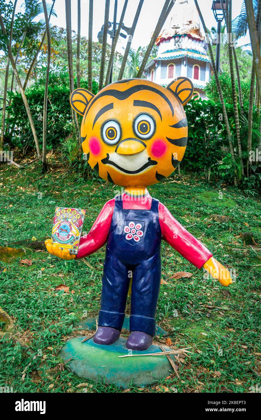Tiger Statue holding Tiger Balm product. This park has statues and ...