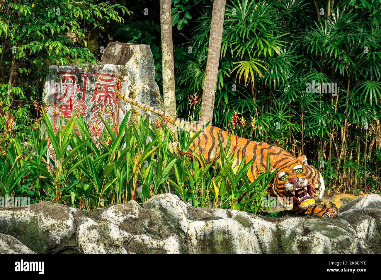 Tiger statue at Haw Par Villa Theme Park. This park has statues and ...