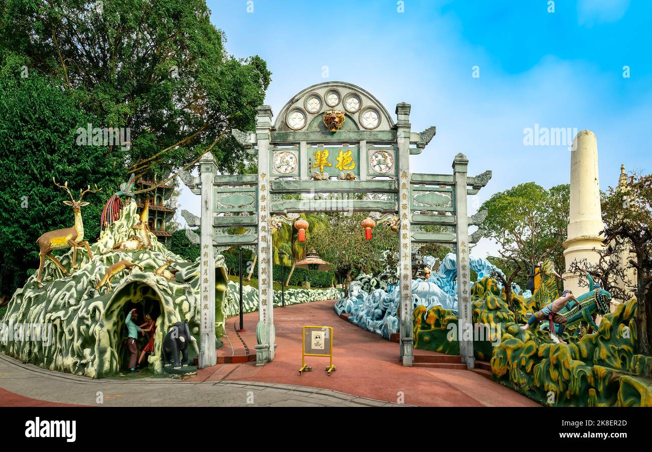 Chinese gateway at Haw Par Villa Theme Park. This park has statues and ...