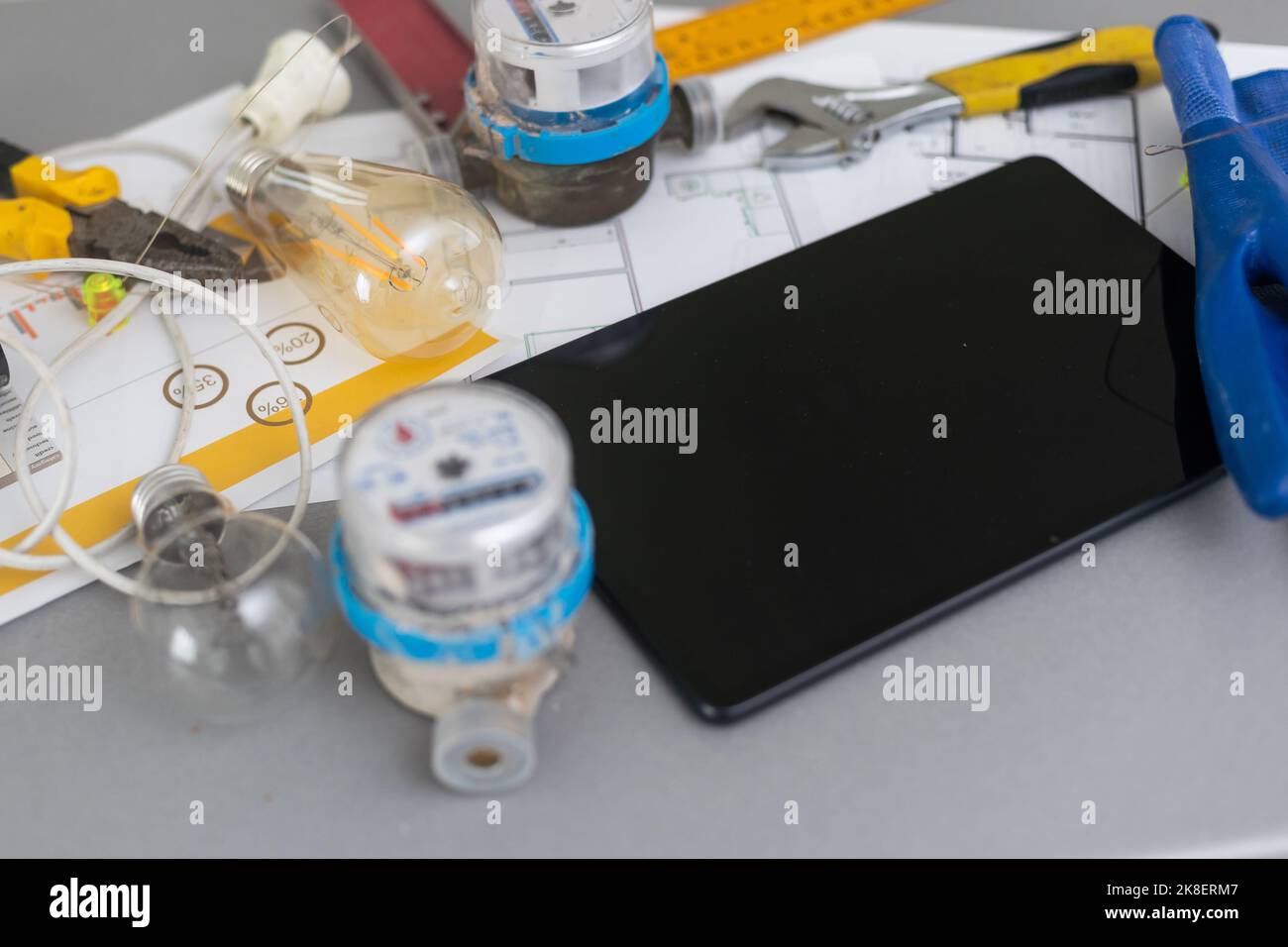 Architect working on blueprint. Architects workplace - architectural ...