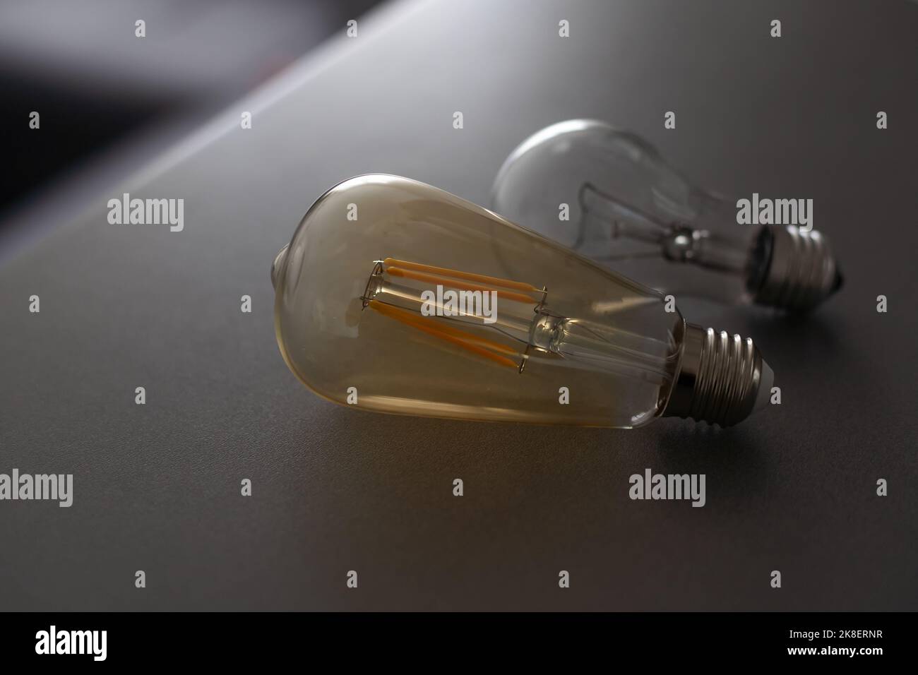 Alternative technology concept . Bulb and Fluorescent bulb comparing ...