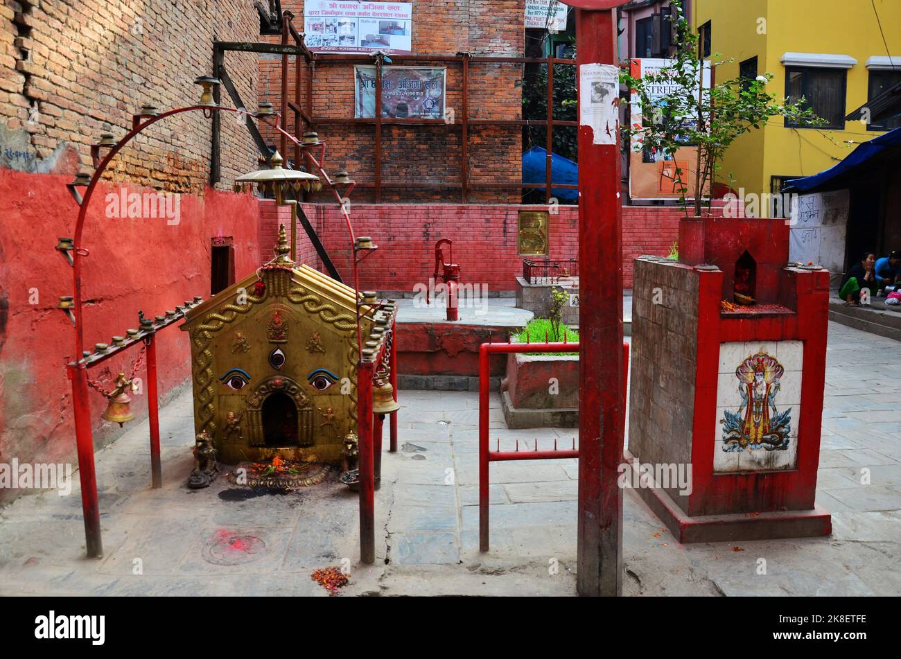 Small hindu shrine and eyes of lord buddha on street old town for ...