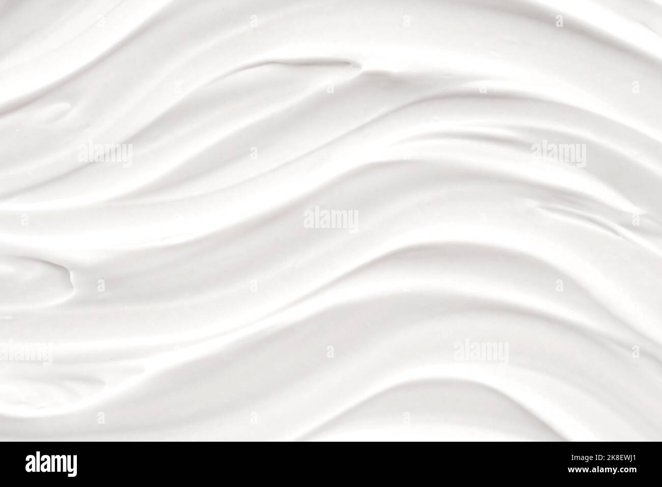 Texture of white face cream is smeared. Cosmetic products for makeup ...