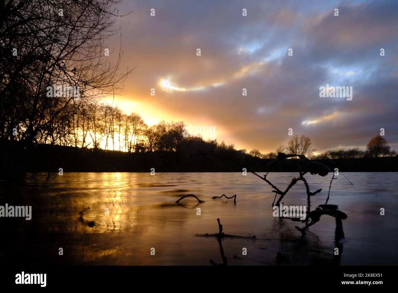 Sunset over Daleford Lake in Whitegate, Cheshire Stock Photo - Alamy