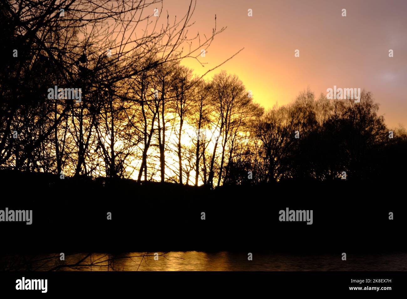 Sunset over Daleford Lake in Whitegate, Cheshire Stock Photo - Alamy