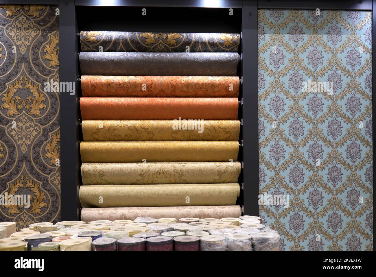 Vinyl wallpaper in roll in building materials store, background ...