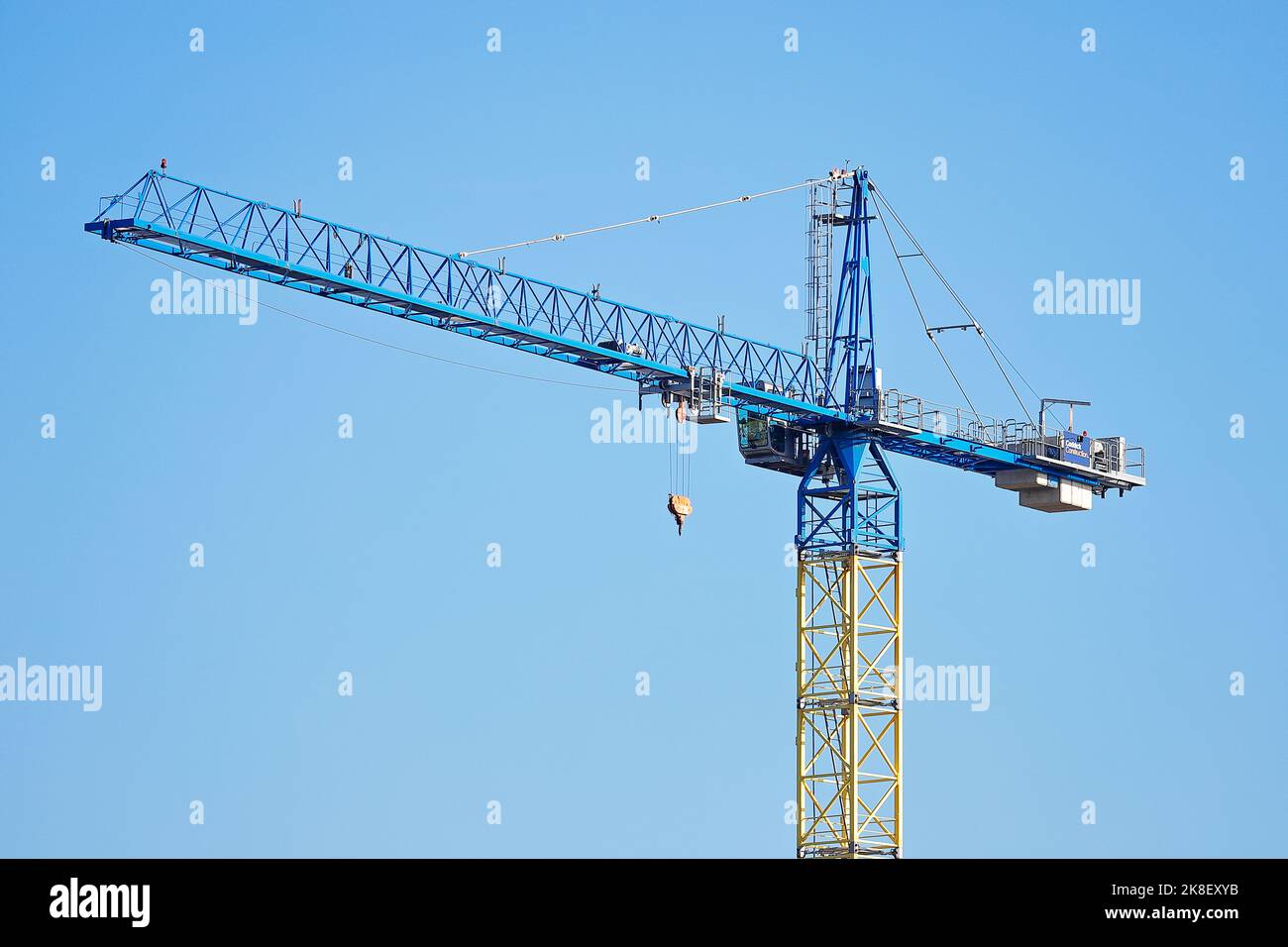 A Blue & Yellow tower crane which is at least one of around 30 ...