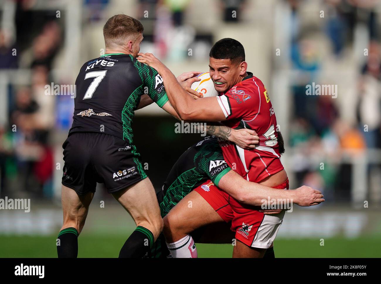 Lebanon's Charbel Tasipale (right) is tackled by Ireland's Joe Keyes ...