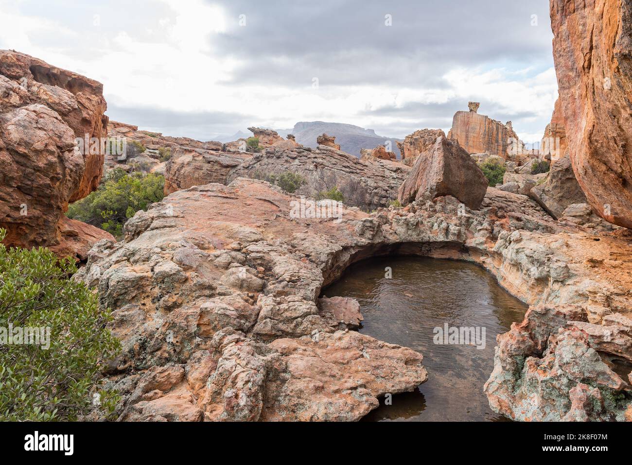 A rain water pool in the rocks at the Stadsaal Caves in the Western ...