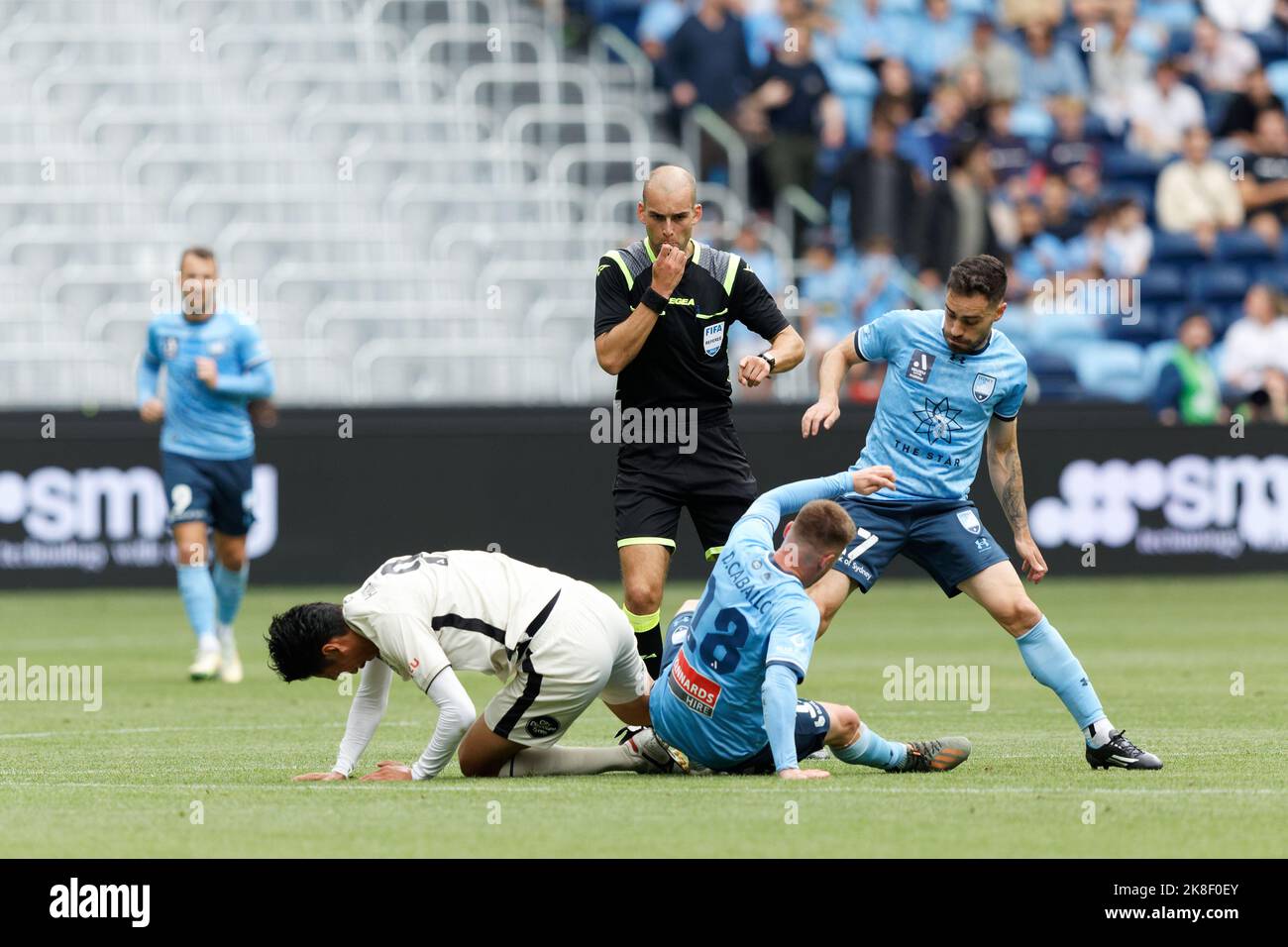 SYDNEY, AUSTRALIA - OCTOBER 23: Referee Daniel Elder blows the whistle ...