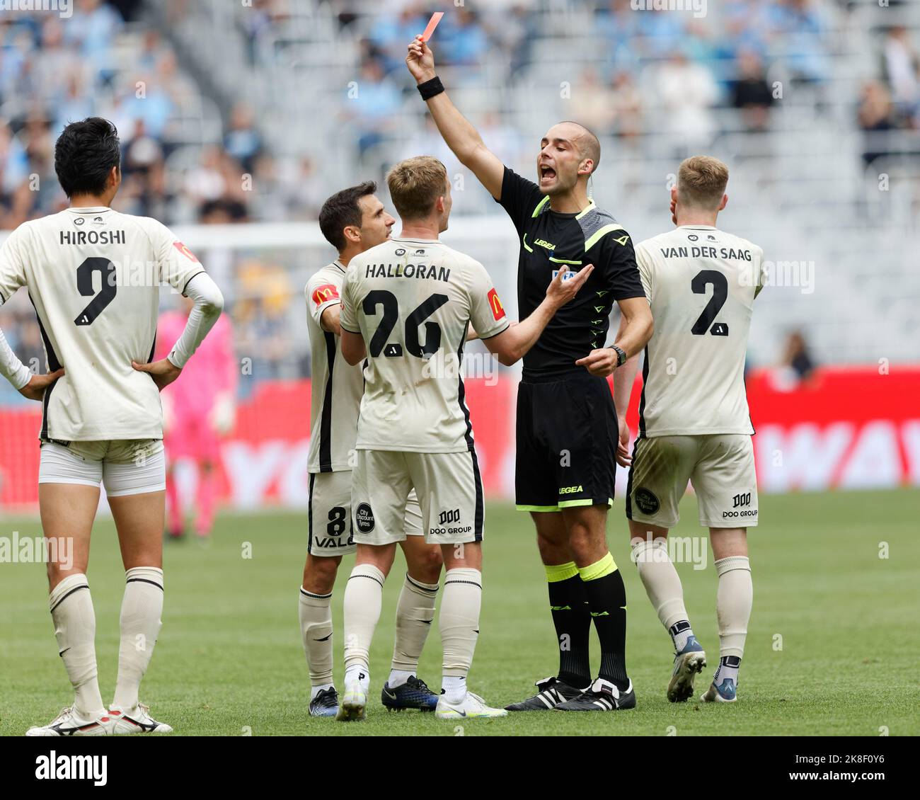 SYDNEY, AUSTRALIA - OCTOBER 23: Referee Daniel Elder gives a red card ...