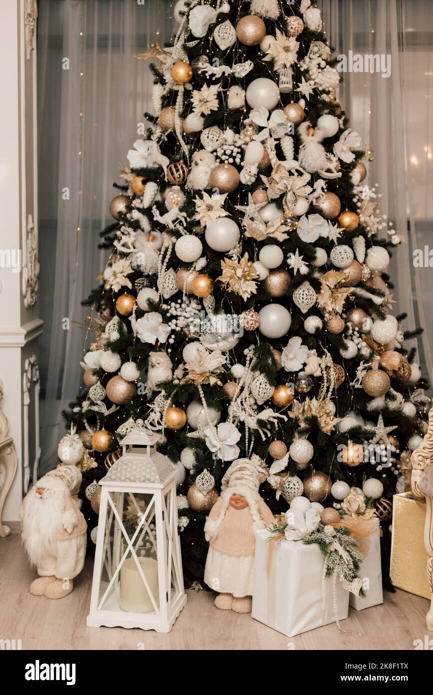 Big beautiful Christmas tree near the window. Christmas Eve at Home ...