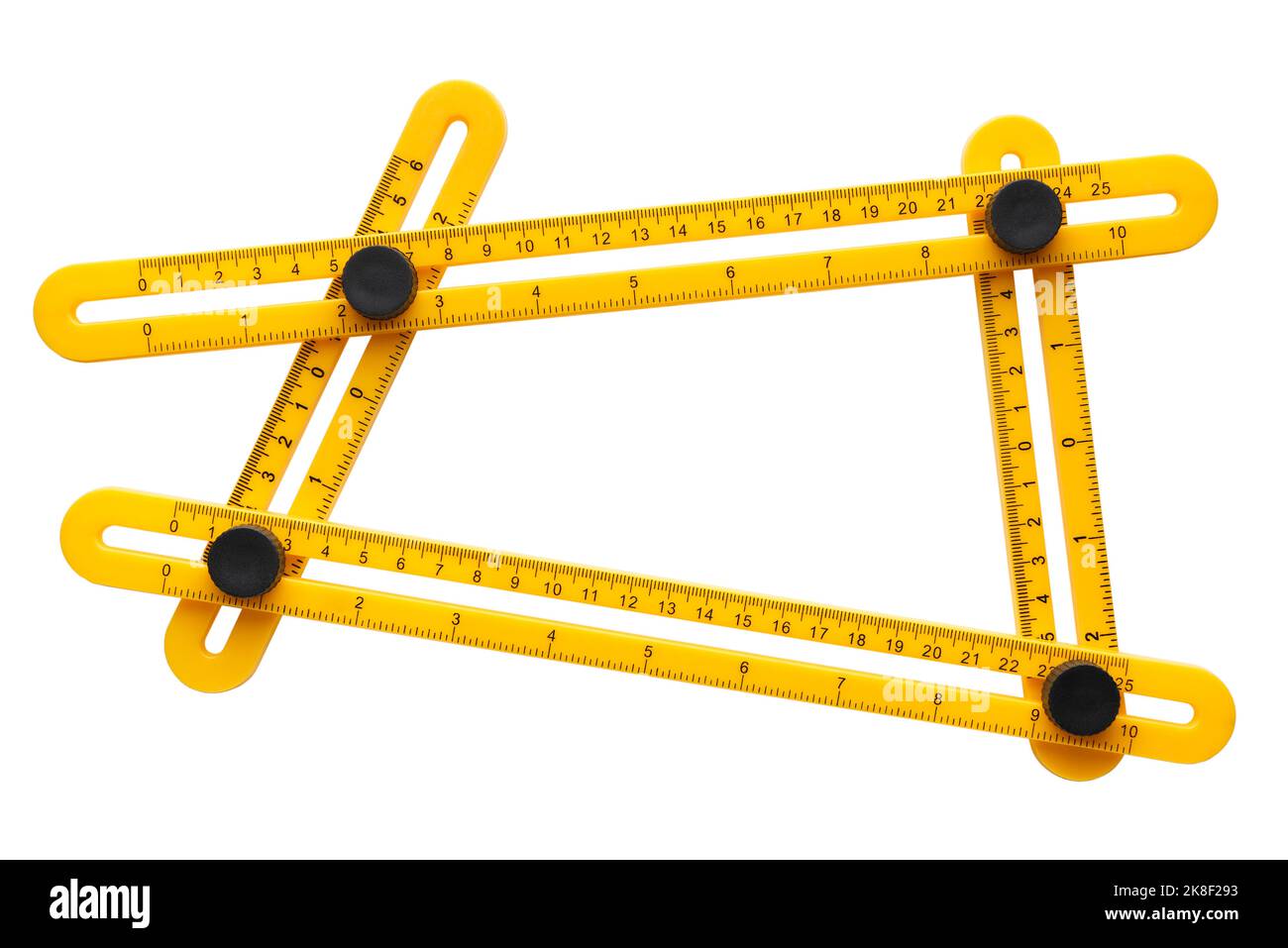 Yellow plastic four-angled ruler, creative picture frame or border ...