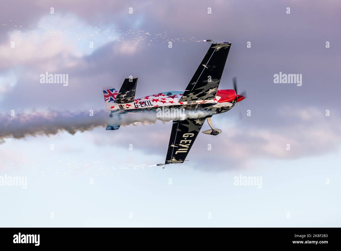 Global Stars Extra 300 ‘G-EXIL’ airborne at the Race Day airshow held ...