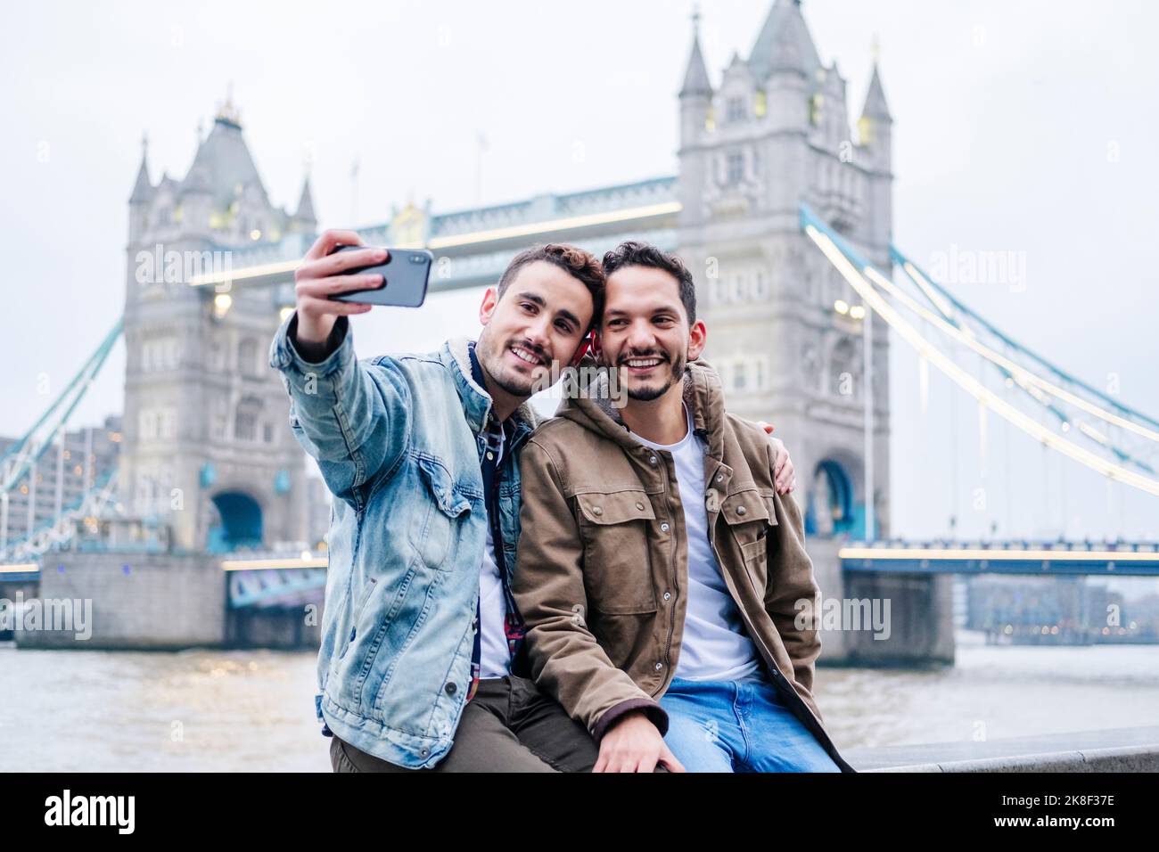 Young man taking pictures in london hi-res stock photography and images ...