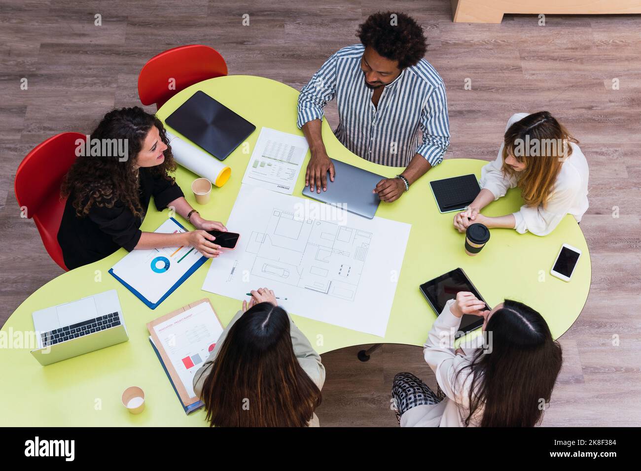 Business team having a meeting at table in conference room Stock Photo ...